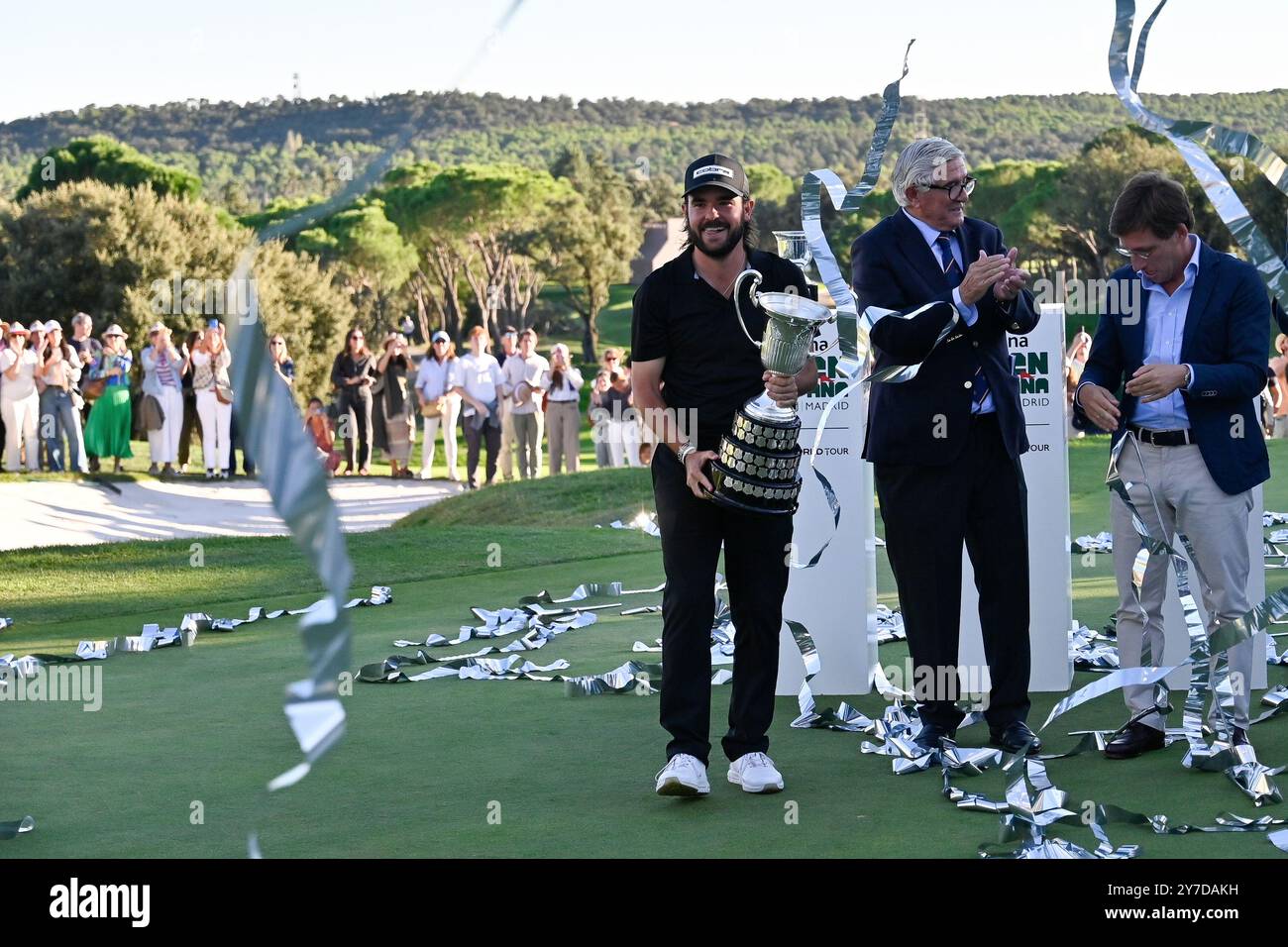 Angel HIDALGO of Spain receives the champion trophy during the Acciona ...