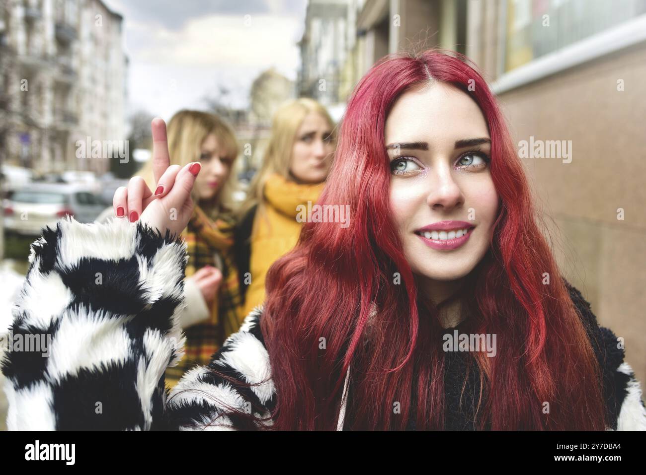 Self-confident teenage girl ignores jealous people who spread gossip ...