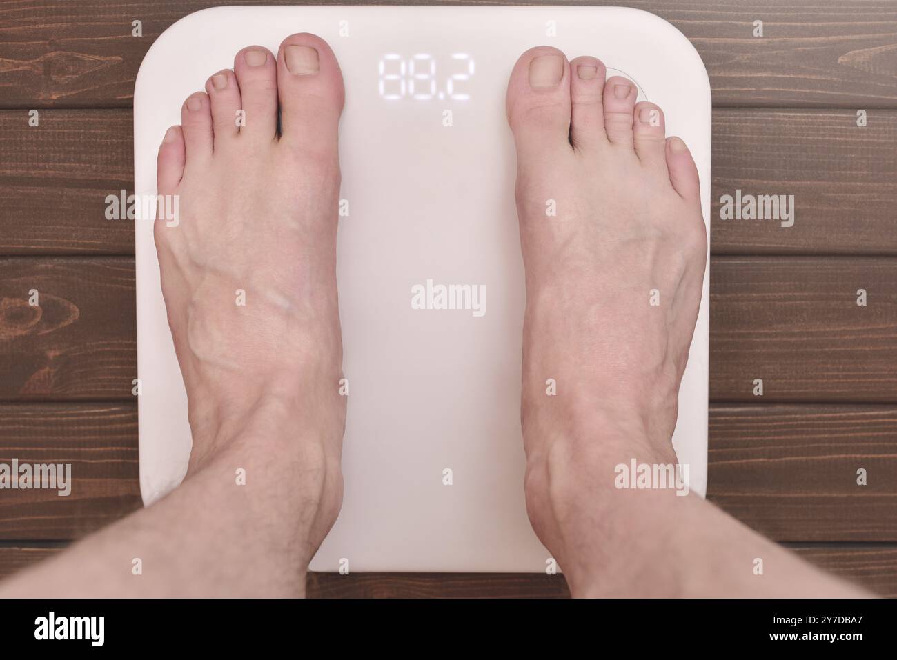 Men's feet on an modern electronic scales. sports concept Stock Photo ...