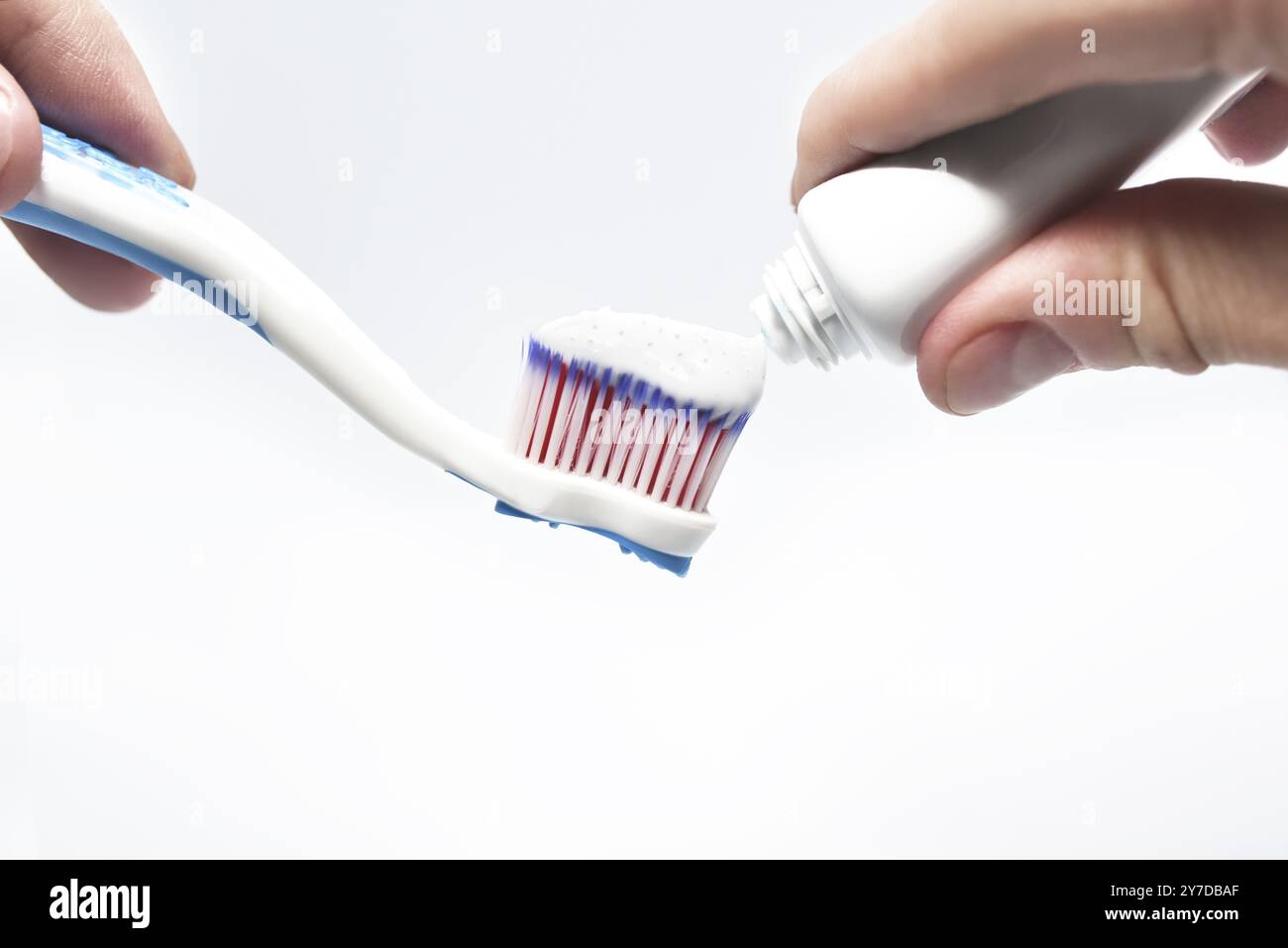Toothpaste brush in mans hand hi-res stock photography and images - Alamy