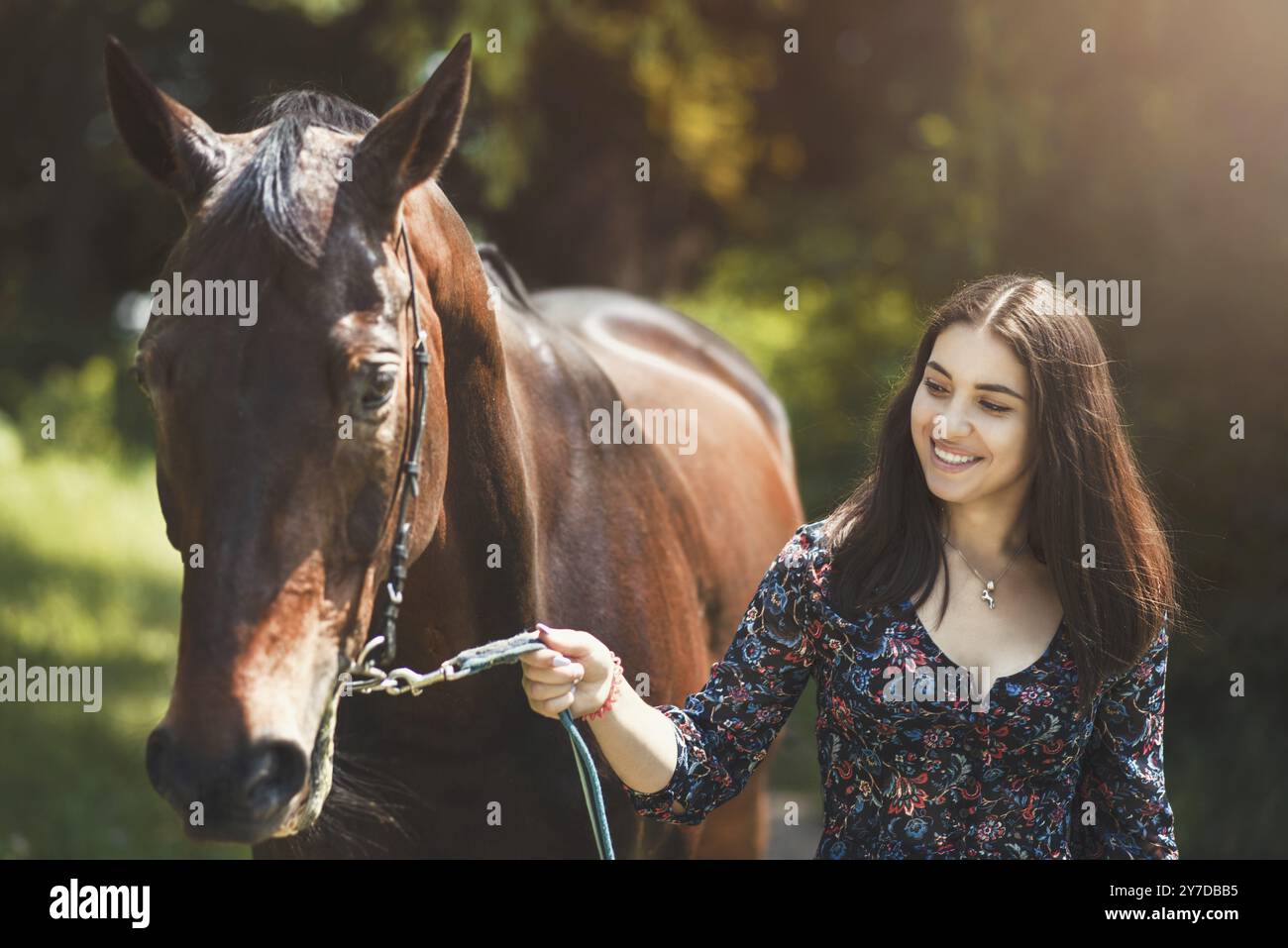 Beautiful Latin woman and her lovely horse walk in the forest. love ...