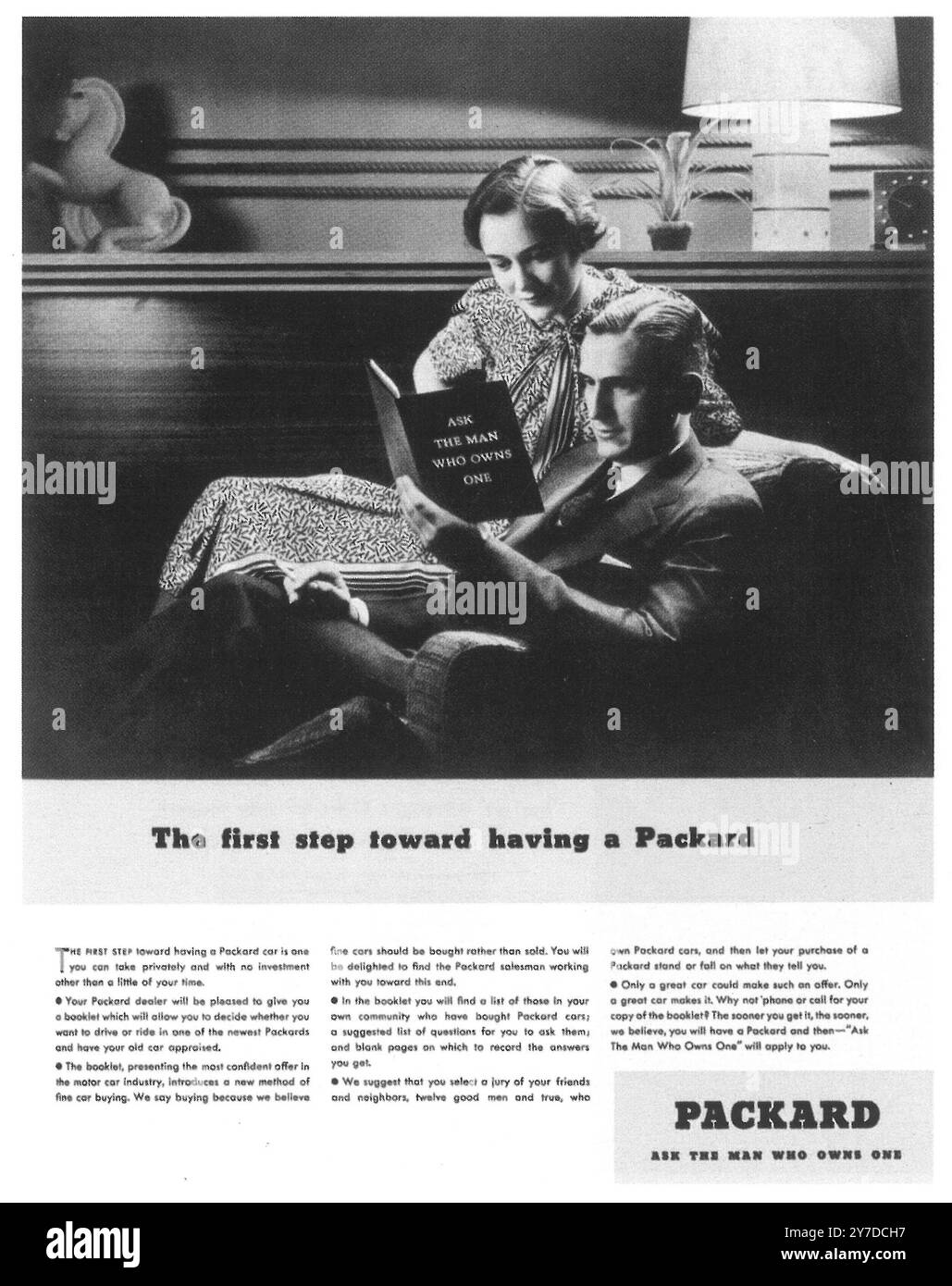 Couple reading booklet Cut Out Stock Images & Pictures - Alamy