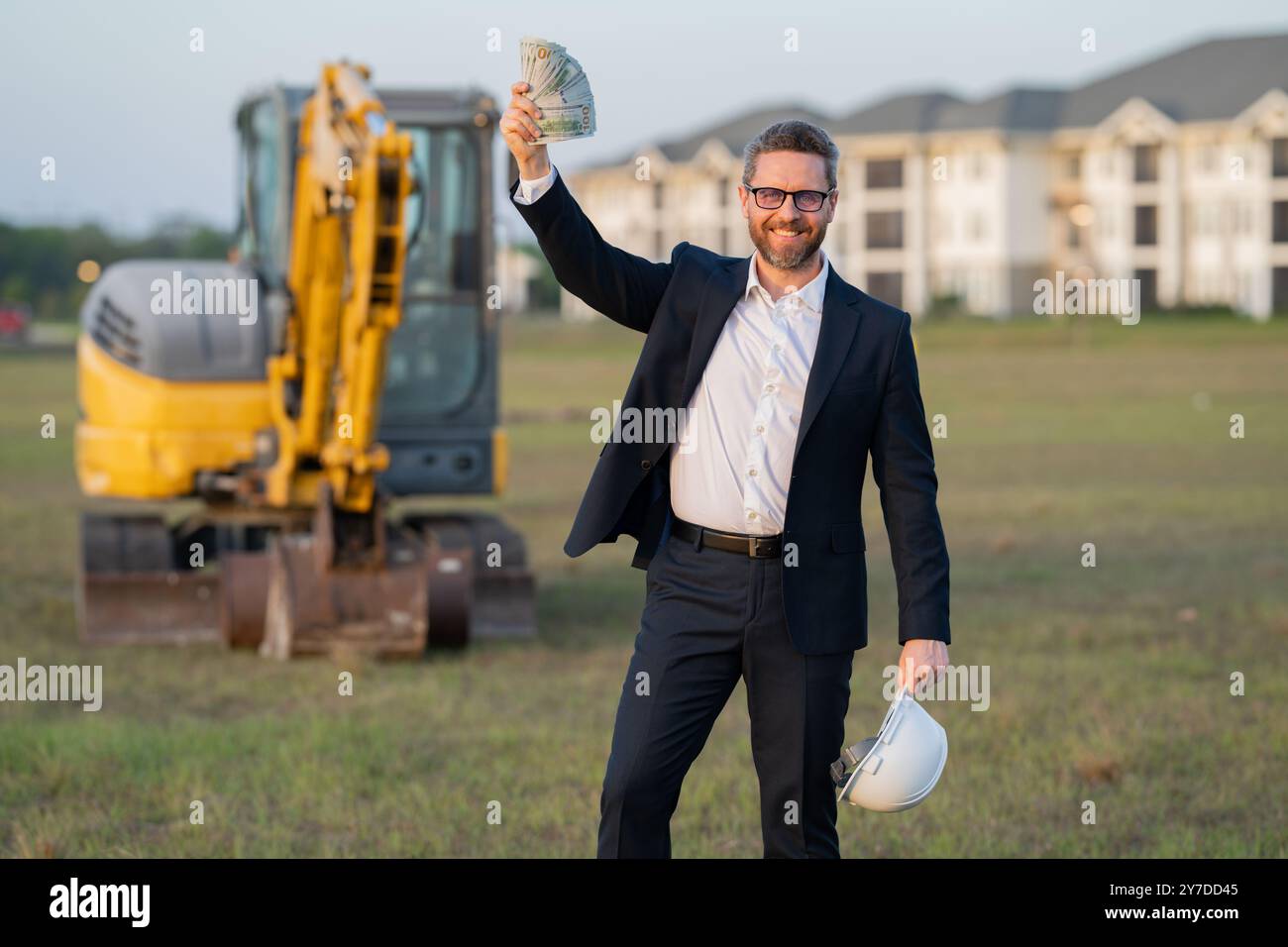 Civil engineer worker at a construction site. Engineer man in front of ...
