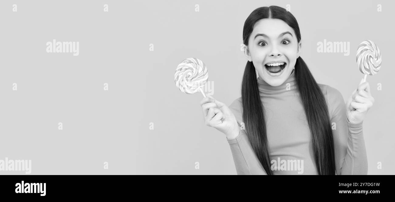 oh my god. cool kid with long hair hold lollypop. sugar candy on stick ...