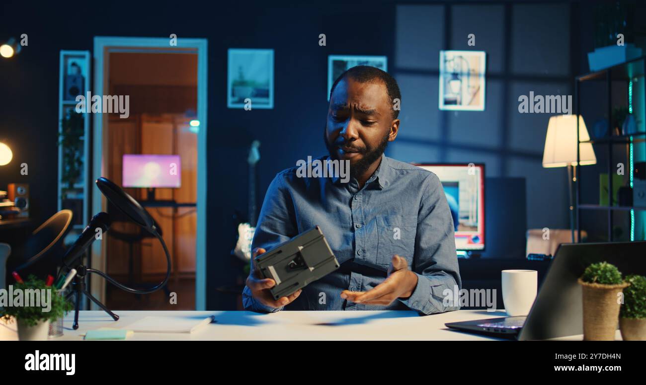 BIPOC content creator filming technology review of newly launched V ...