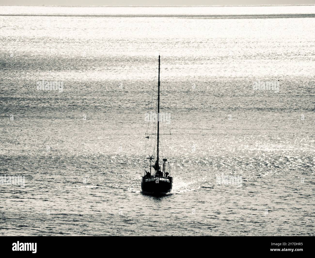 Yacht on a siver sea Stock Photo - Alamy