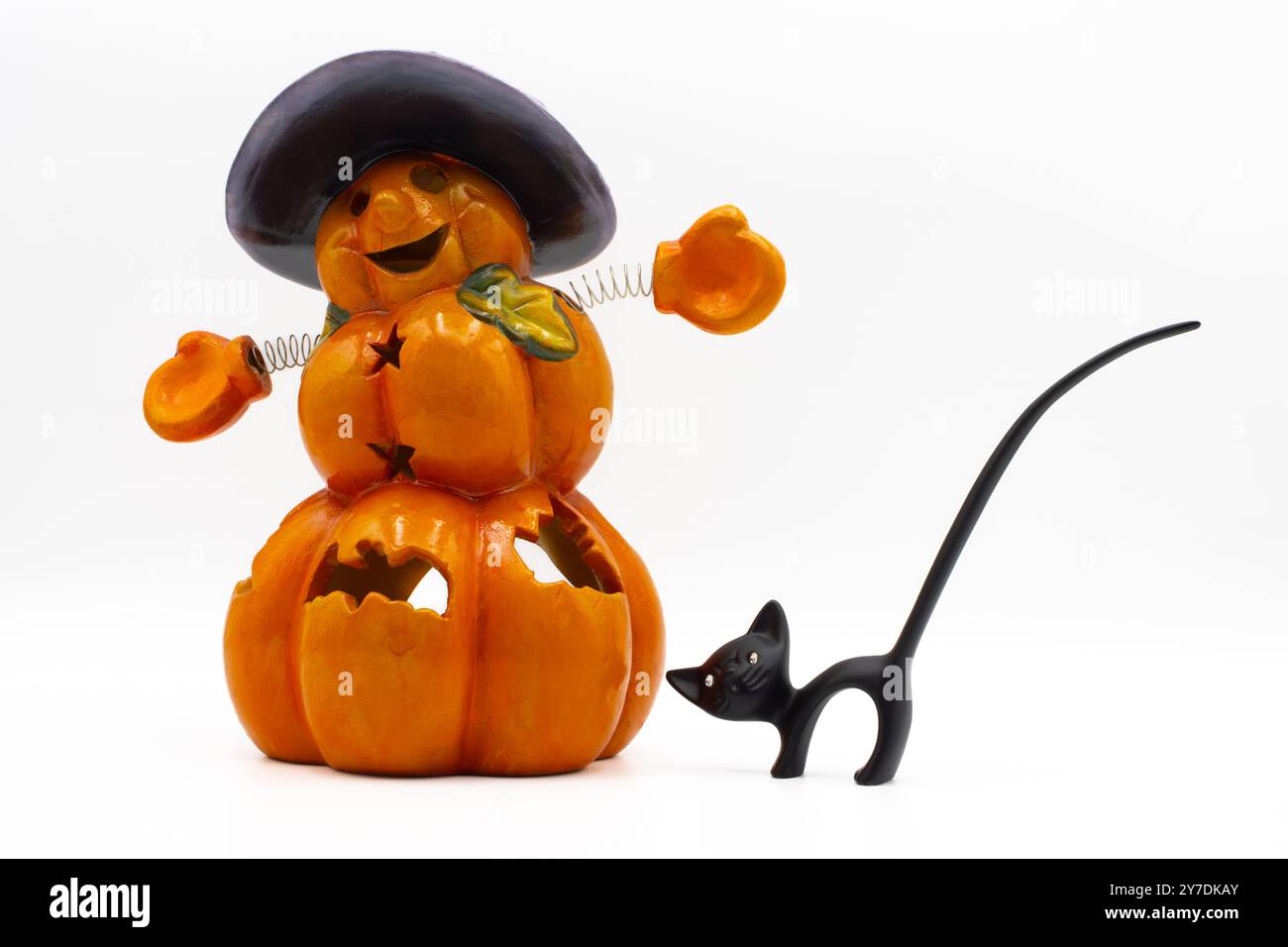 Jack O Lantern and and a black cat figurine. Ceramic candle holder in ...