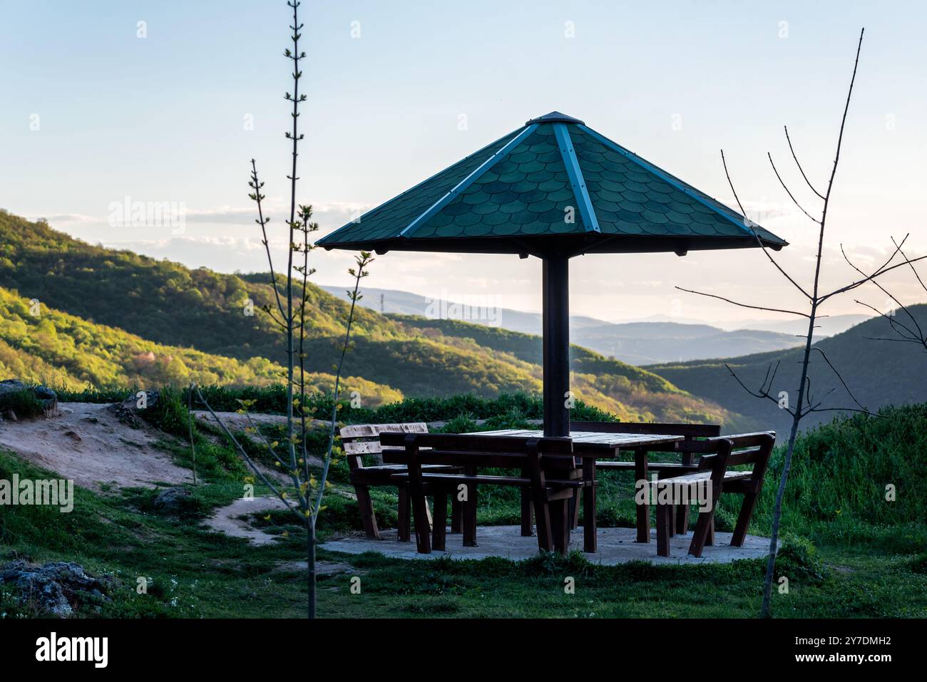 Table and benches in the mountain with a canopy as resting place from ...