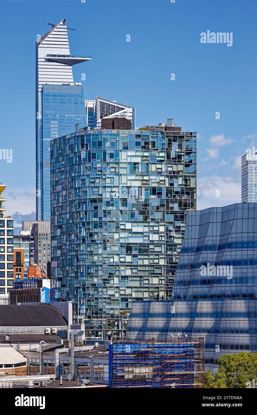 The unique abstract glass mosaic façade of Jean Nouvel-designed 100 ...