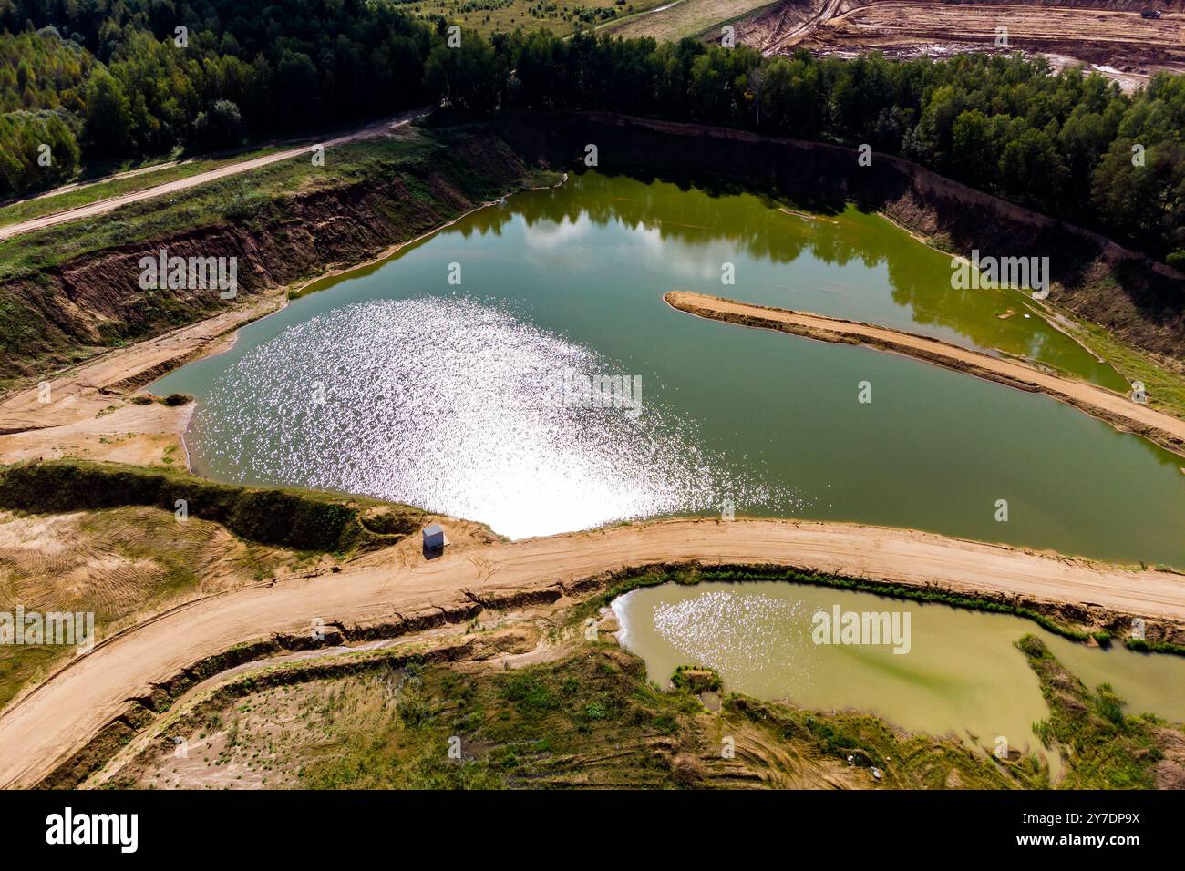 Aerial view of a flooded area of a sand quarry, quarry pond Stock Photo ...