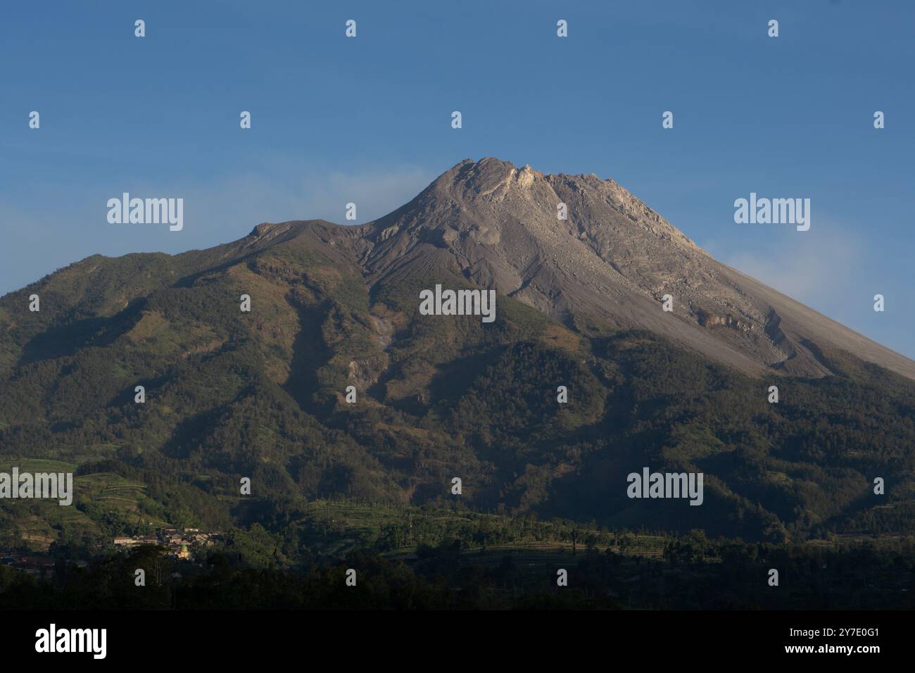 The great Mount Merapi Volcano with clear blue sky in the background ...