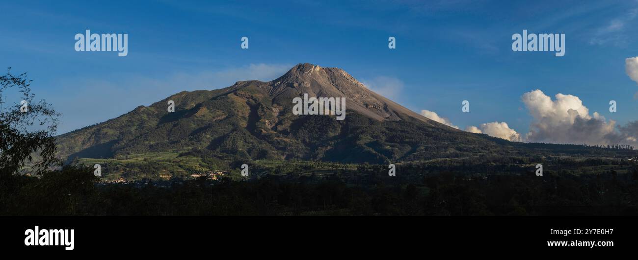 Panoramic view of the great Mount Merapi Volcano with clear blue sky in ...