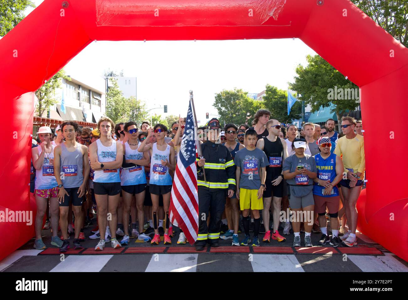 Alameda, CA - July 4, 2024: Participants line up at the starting line ...