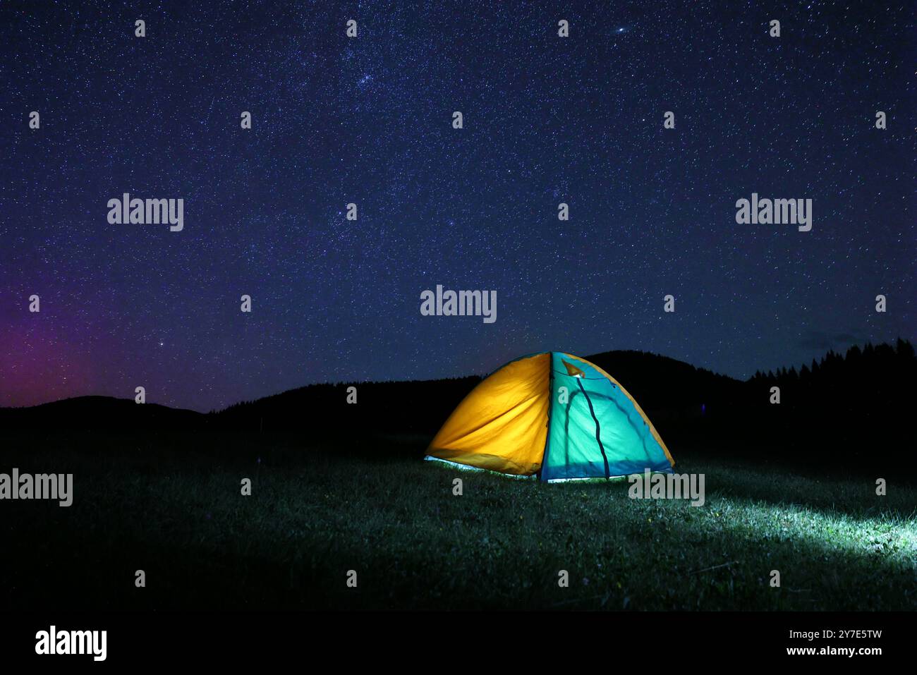 Modern camping tent in wilderness at night Stock Photo - Alamy