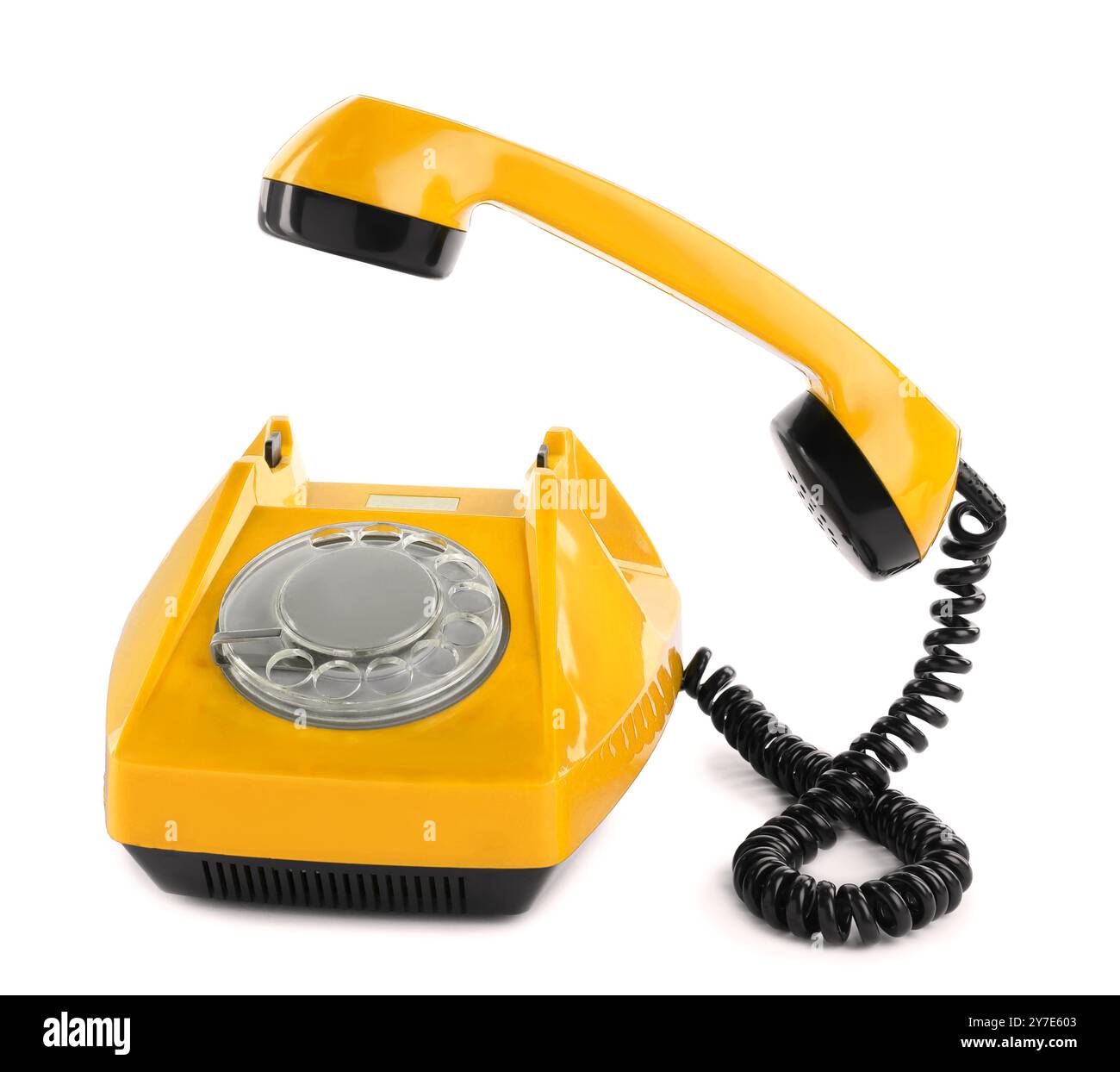 Old yellow telephone with rotary dial isolated on white Stock Photo - Alamy