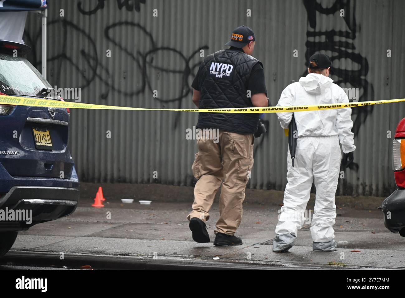 Bronx, United States. 29th Sep, 2024. Crime scene investigators use ...
