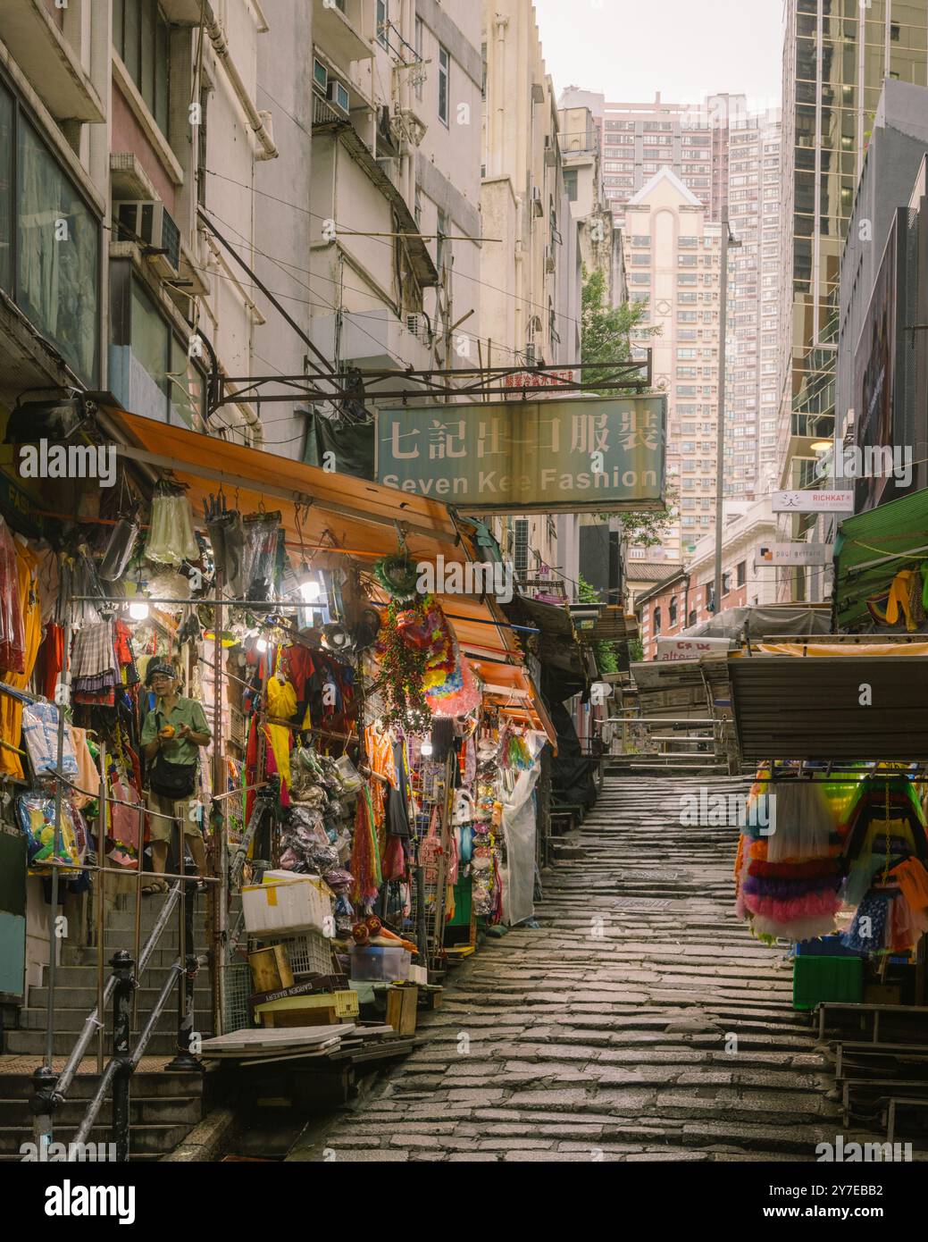 Old Hong Kong street in Central, with steep steps and shops selling ...