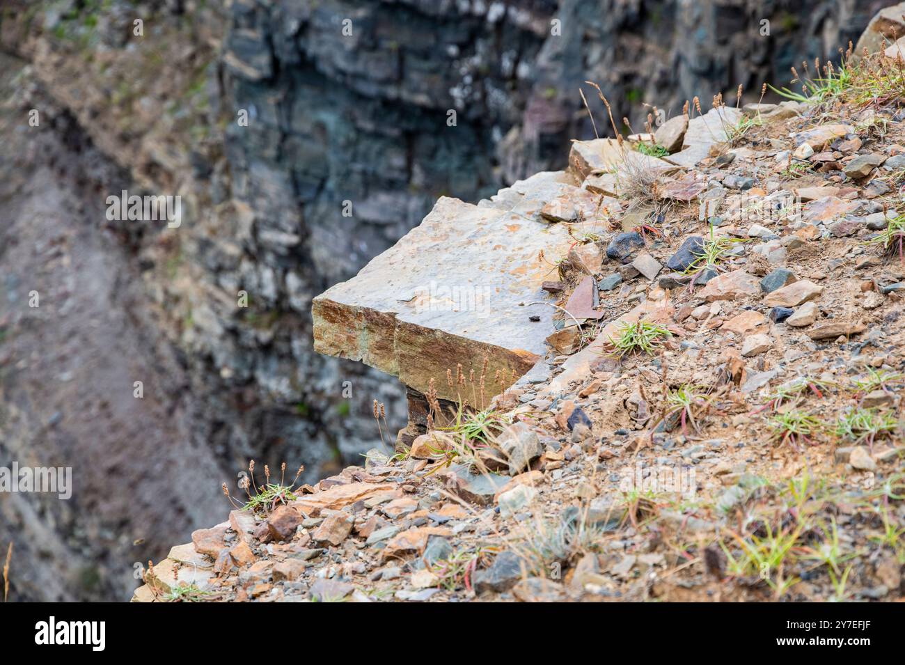 Undercut erosion at the Bell Island heritage lighthouse in Newfoundland ...