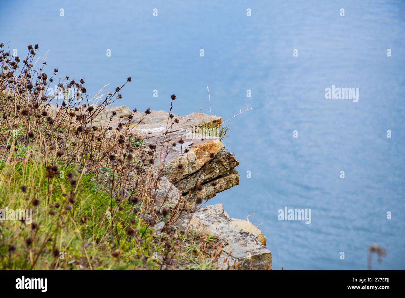 Undercut erosion at the Bell Island heritage lighthouse in Newfoundland ...
