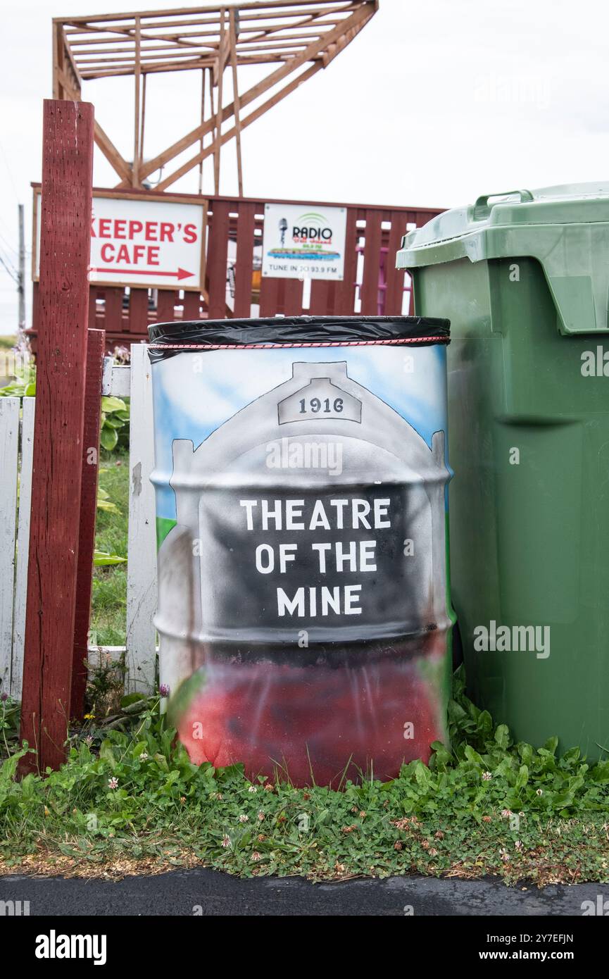 Theatre of the mine sign on a steel garbage can at Keeper’s Cafe on ...