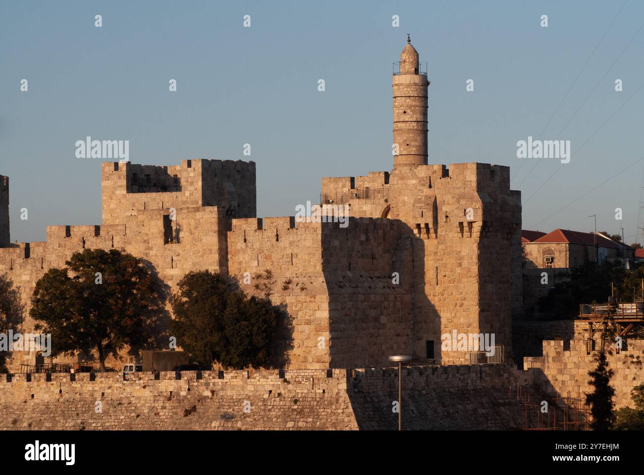 Afternoon view of the landmark, stone Tower of David citadel as golden ...