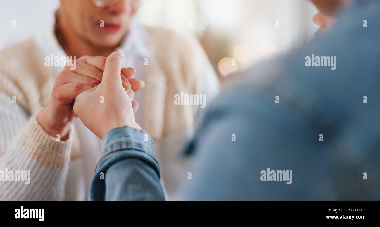 Christian, holding hands and people with prayer in home for religious ...