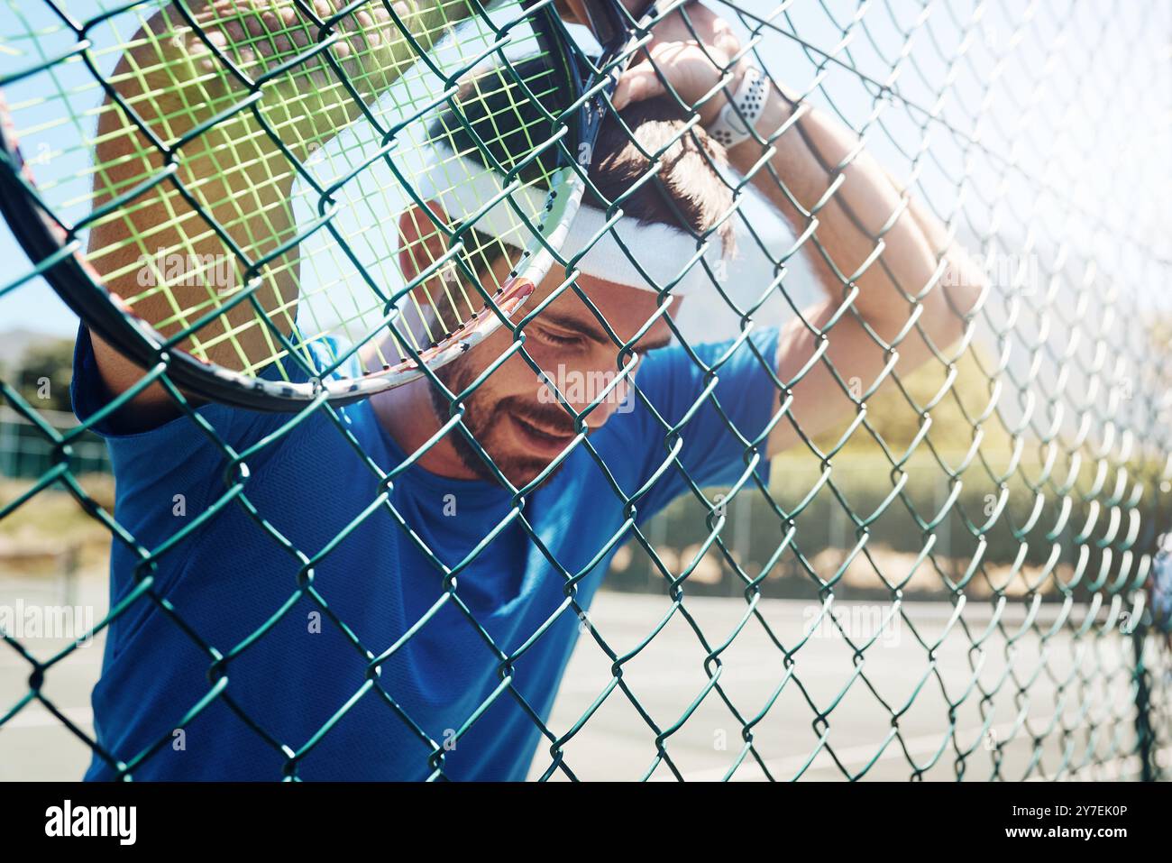 Tired, man and tennis player on court for sports match, training or ...