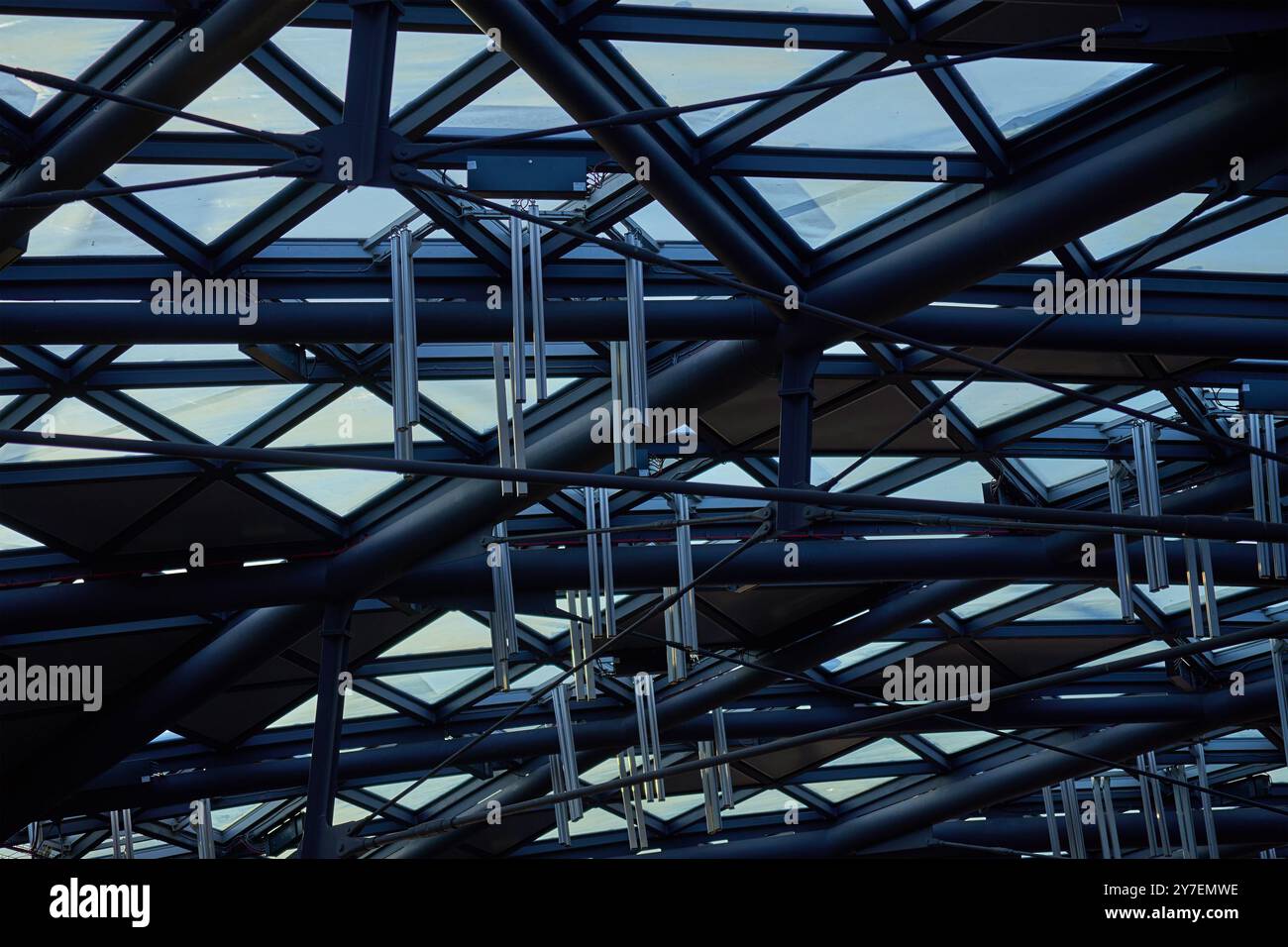 Modern building ceiling composed of metal beams and glass panels ...