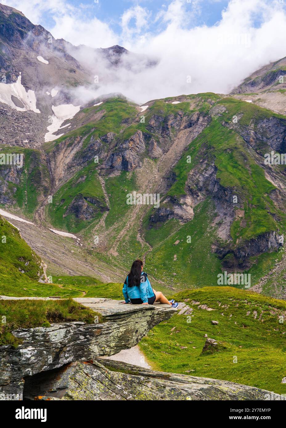 Hiker girl sitting on rocky hi-res stock photography and images - Alamy