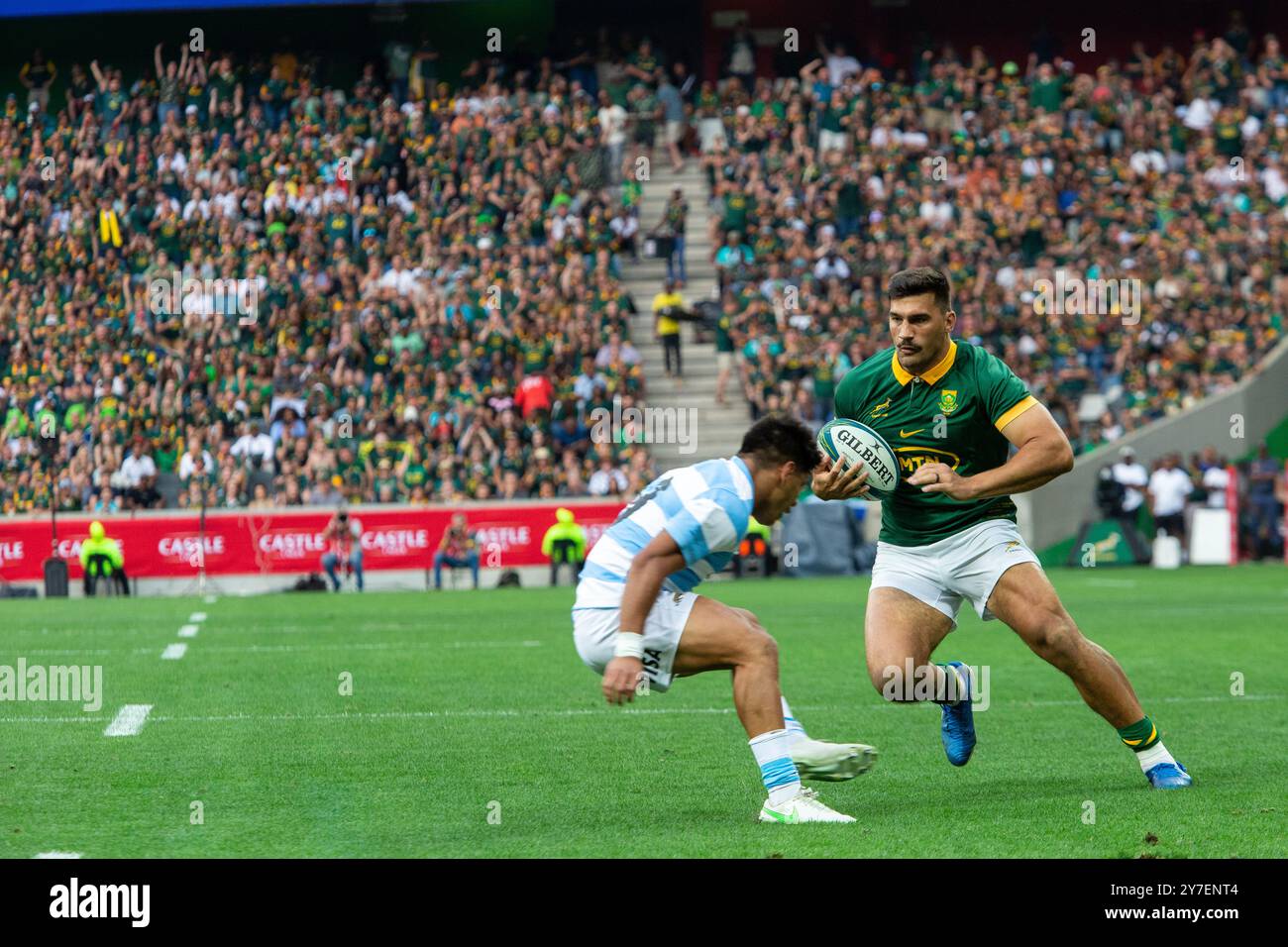 Damian de Allende side-steps a Pumas player during the Castle Lager ...