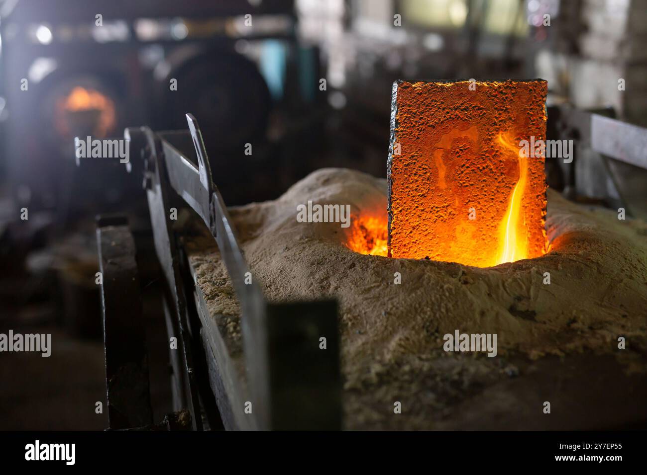 Foundry - ferrous metal is melted in an induction furnace of ...