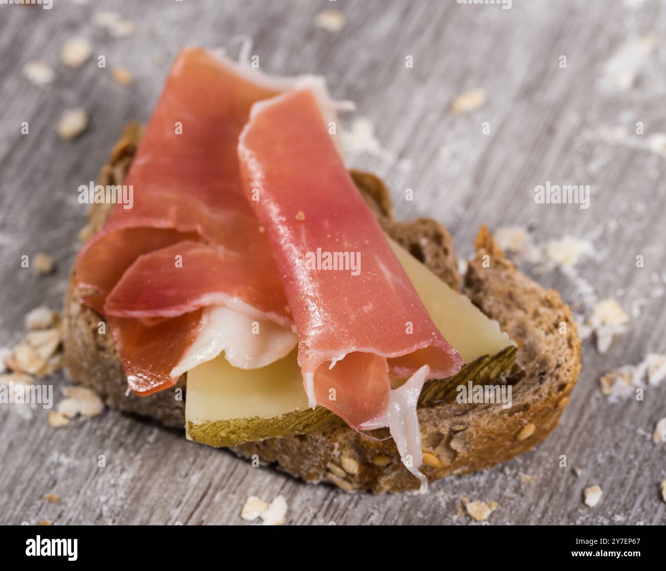 Sandwich made with rye bread cheese and Parma ham Stock Photo - Alamy