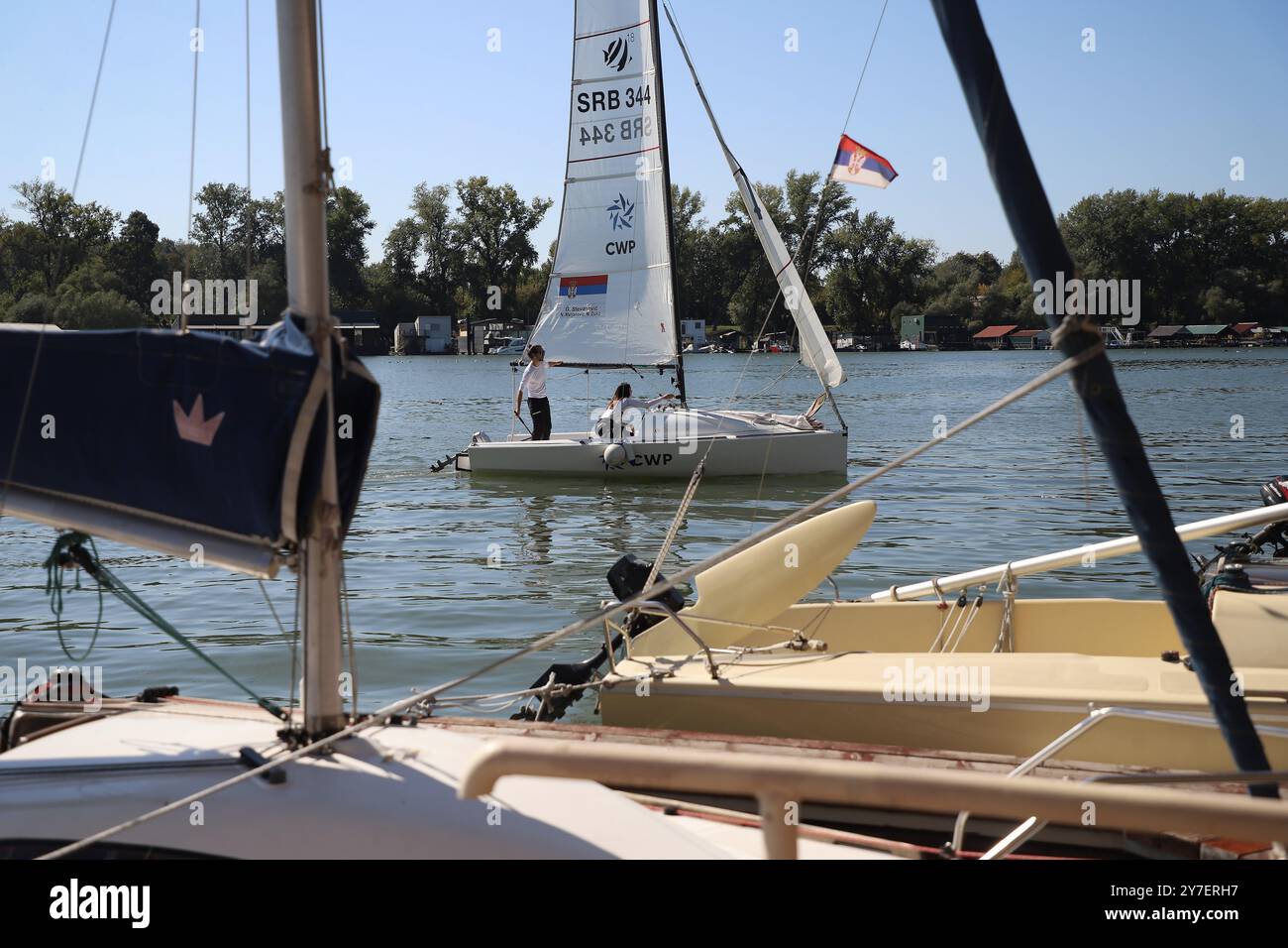 Serbia, September 28, 2024: Crew members of a Micro Class sailing yacht ...