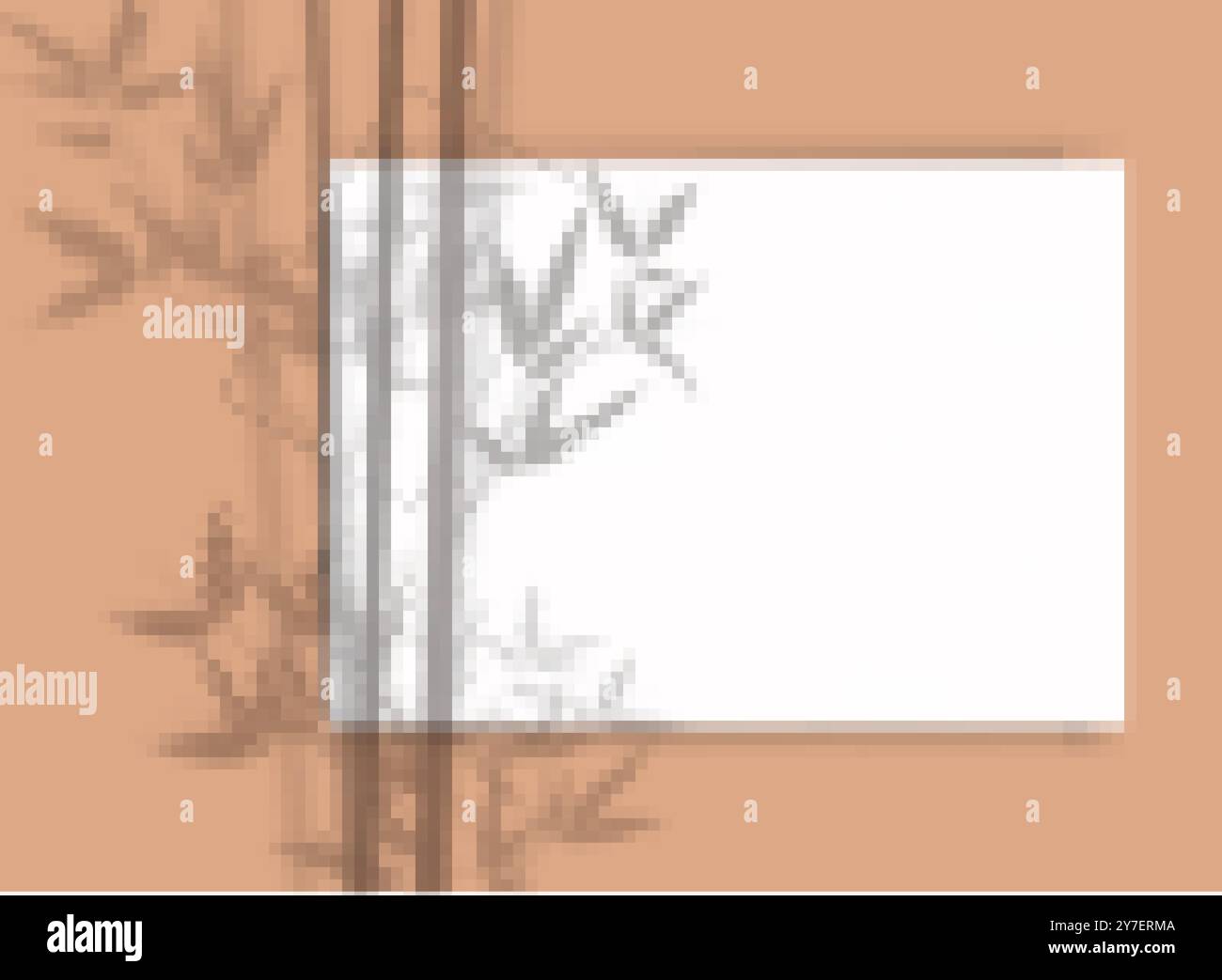 A4 paper mockup with overlay leaf shadow from window. Bamboo branch ...