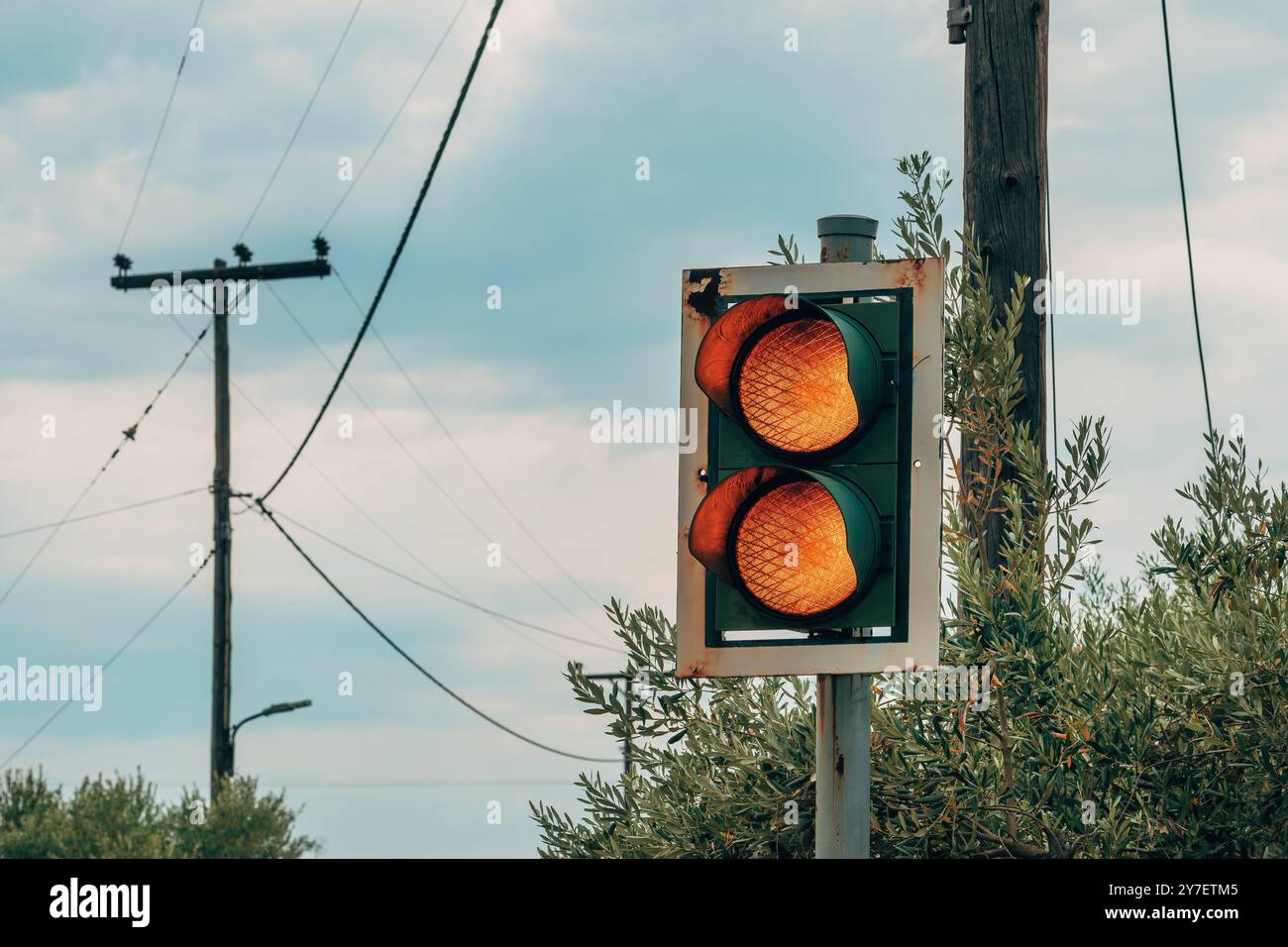 Flashing yellow traffic light semaphore, selective focus Stock Photo ...