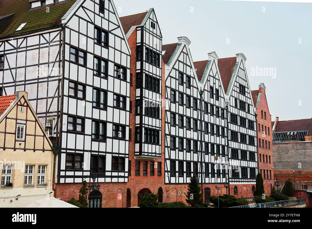 Row of colorful half timbered buildings with gabled roofs in old town ...
