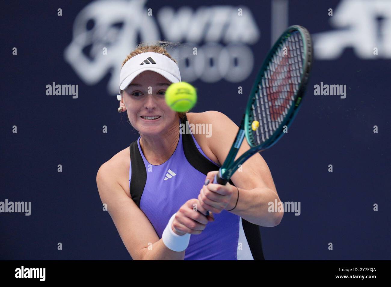 Ashlyn Krueger of the United States returns a shot from Aryna Sabalenka ...