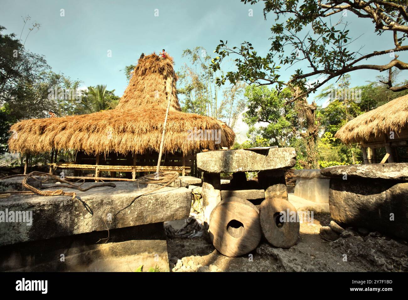 A house is getting new thatched on its roof in the traditional village ...