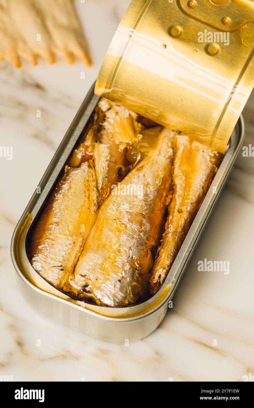 open tin of sardine in olive oil Stock Photo - Alamy