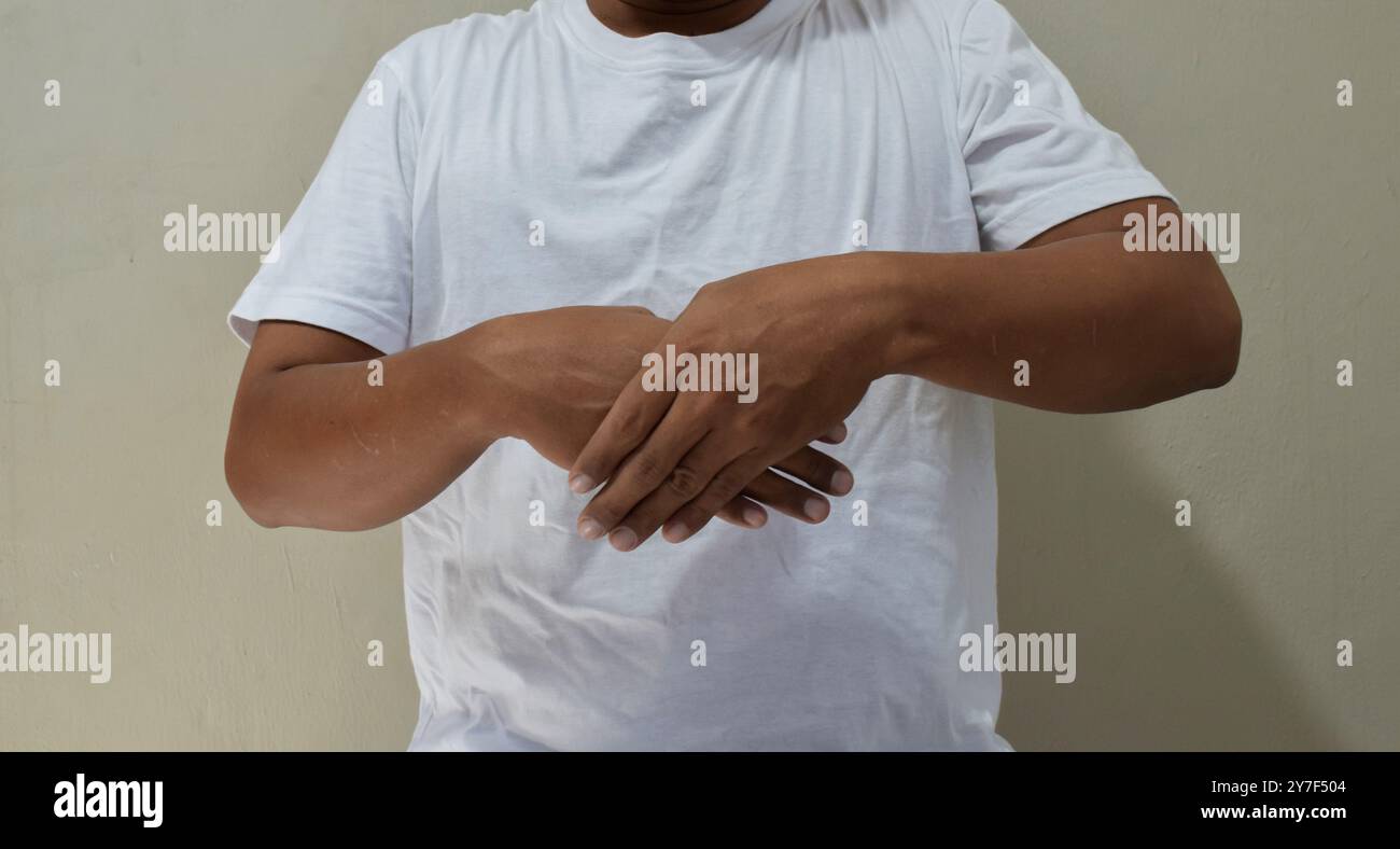 Young man learning sign language, communication for deaf Stock Photo ...