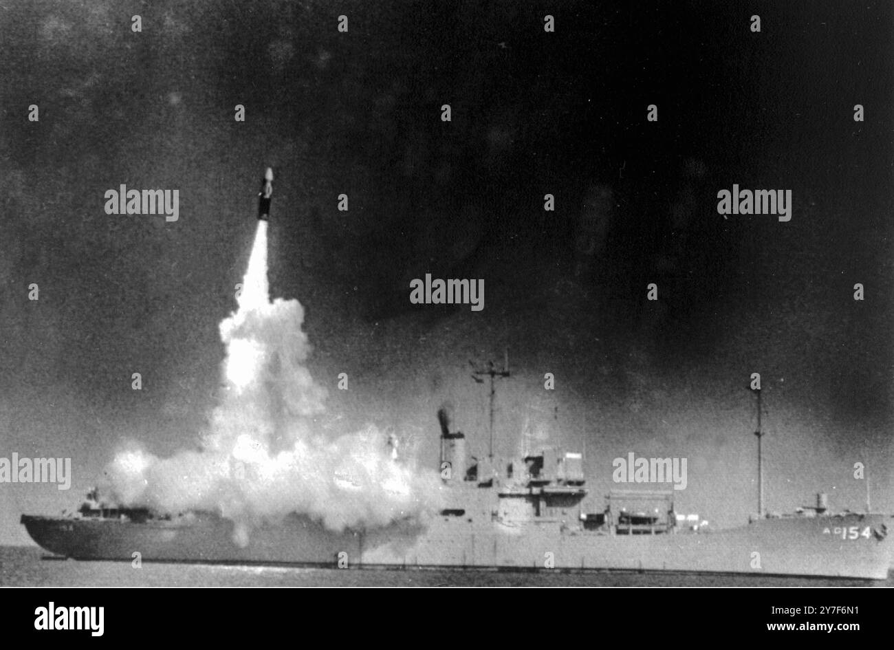 The first launch of a Poseidon missile from a surface vessel is carried ...