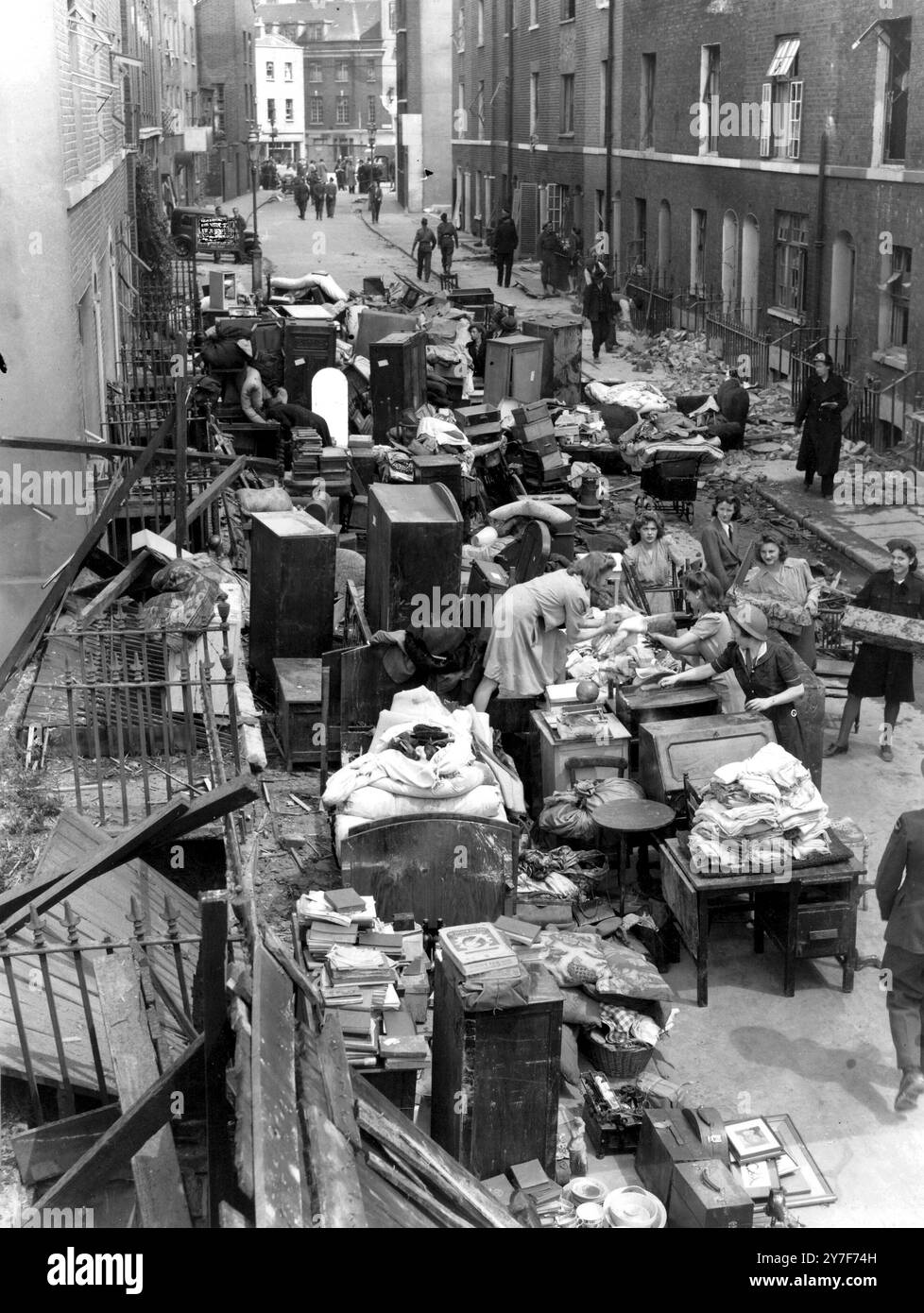 Furniture and other household belongs salvaged from a wrecked homes are ...