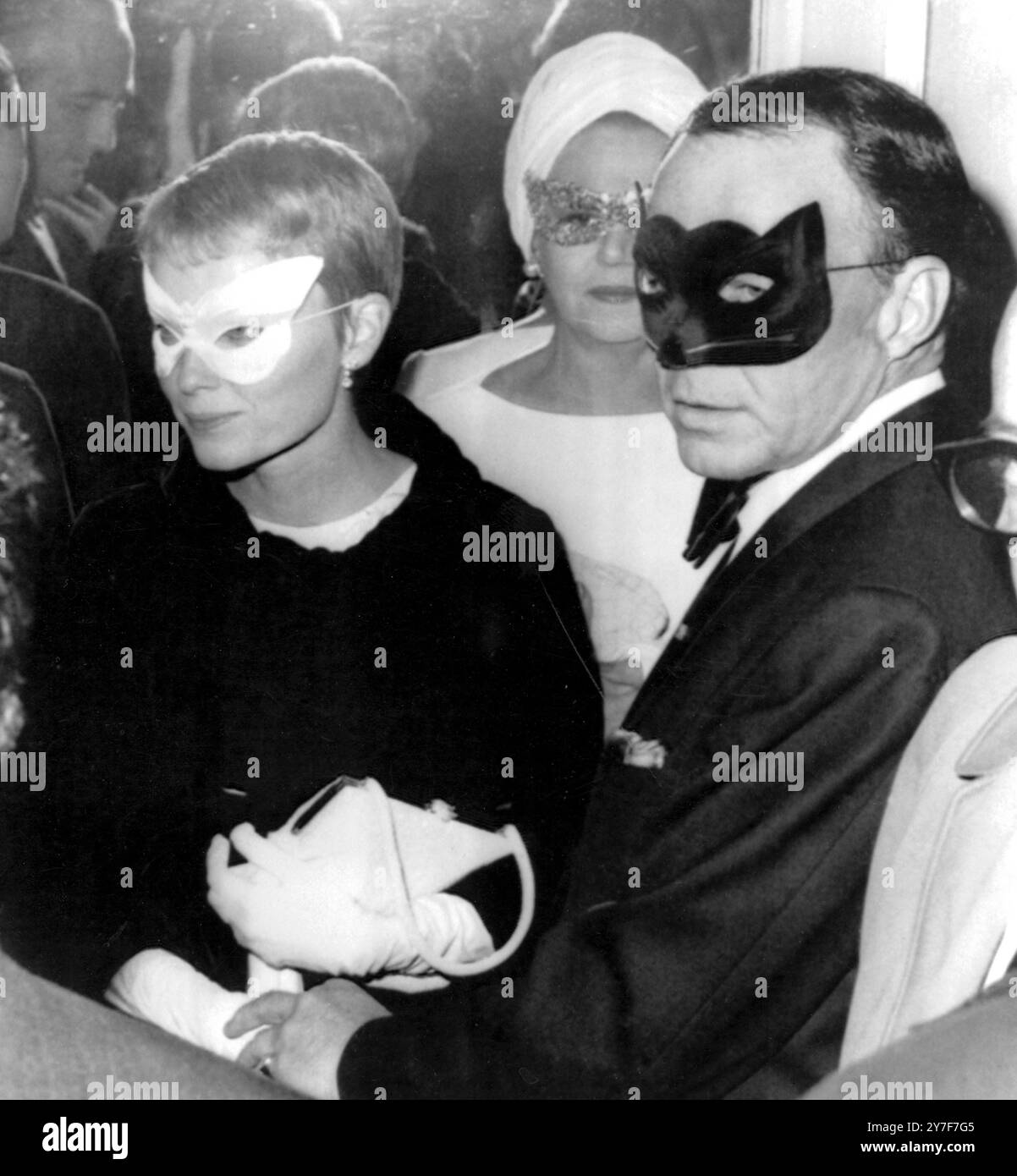 Frank Sinatra and his wife, Mia Farrow arrive for a masked ball thrown ...