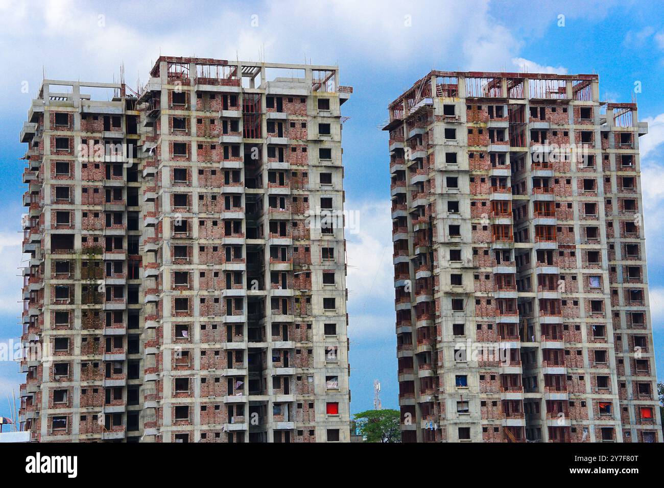 Under construction residential twin tower buildings with concrete block ...