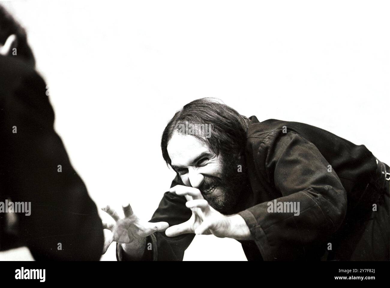 Rasputin wrestles with two fellow monks in a scene from The Rasputin ...