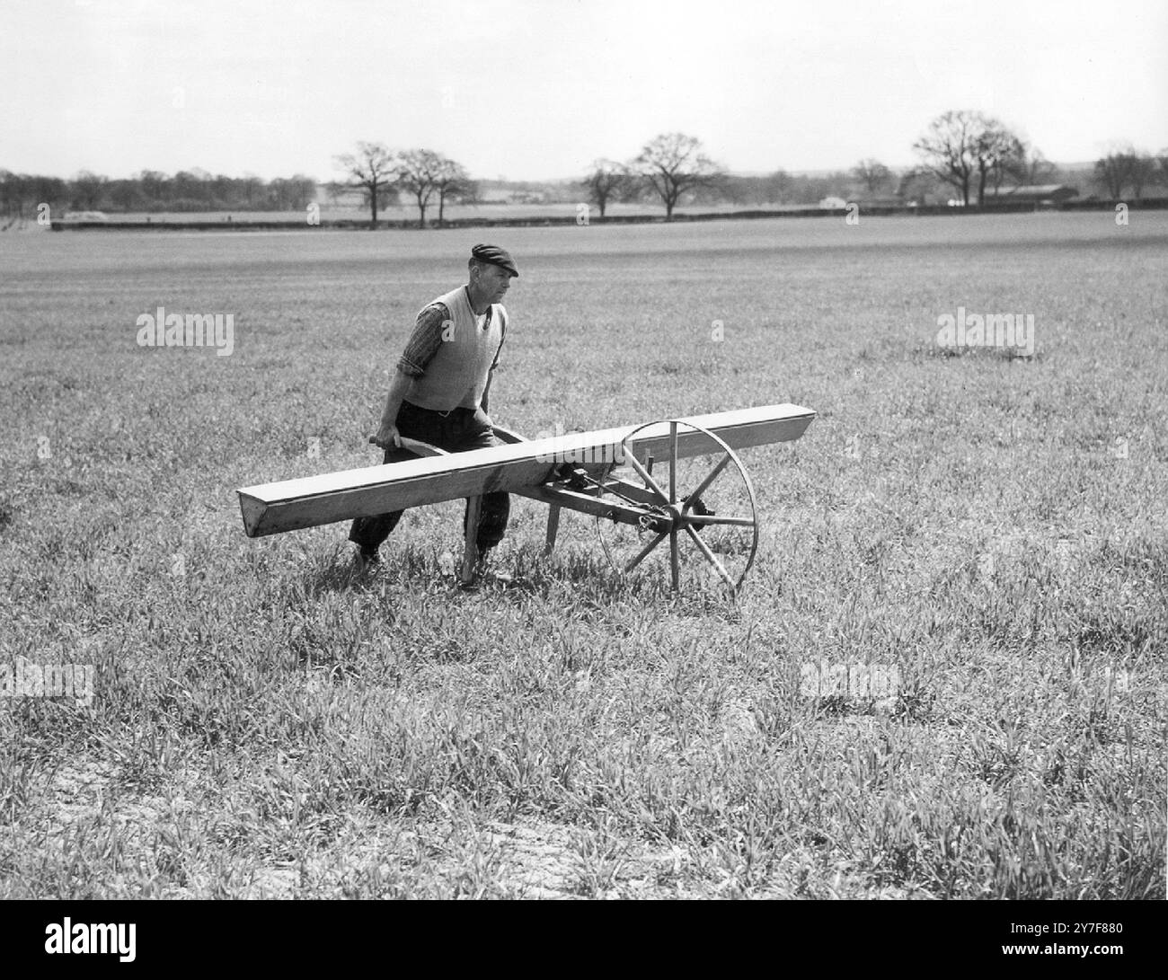 Hard work pushing a seed barrow up and down a twenty acre field. But a ...
