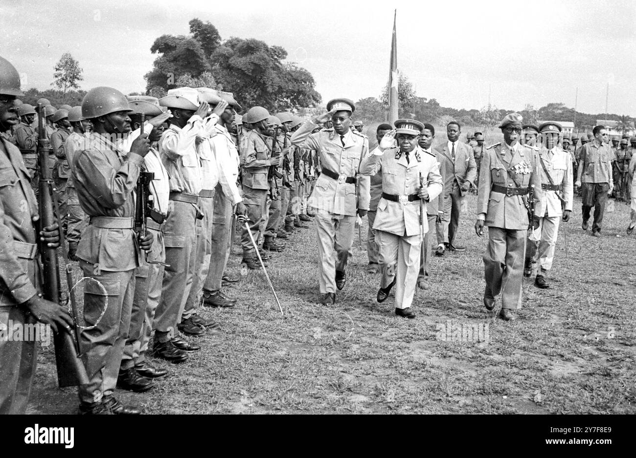 Congo President, Joseph Kasavubu (2nd right) reviews troops accompanied ...