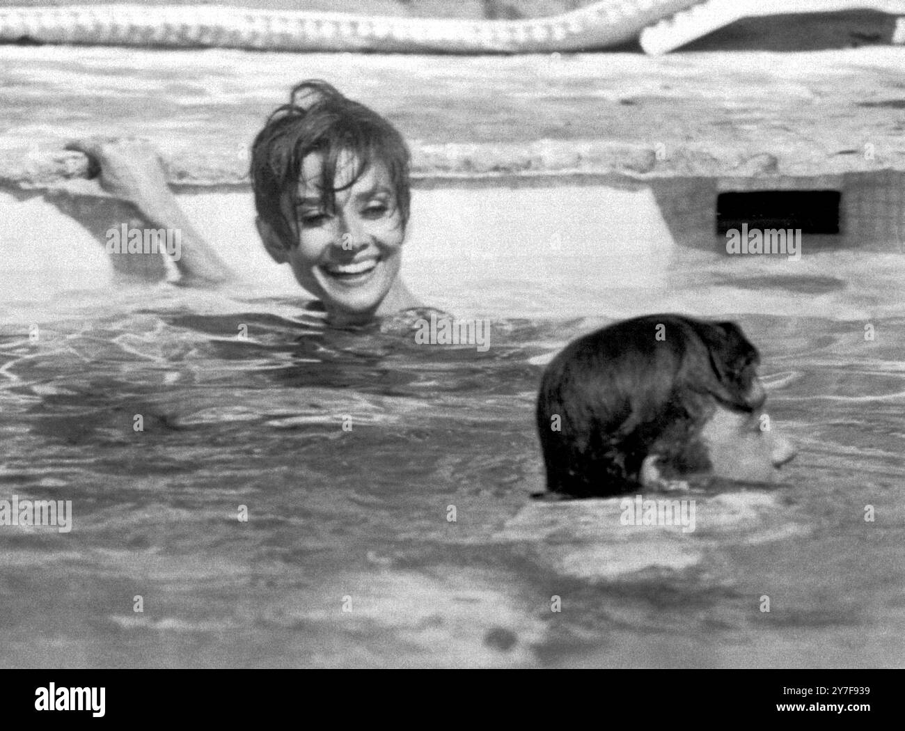 Audrey Hepburn and Albert Finney shoot swimming pool scenes at a French ...