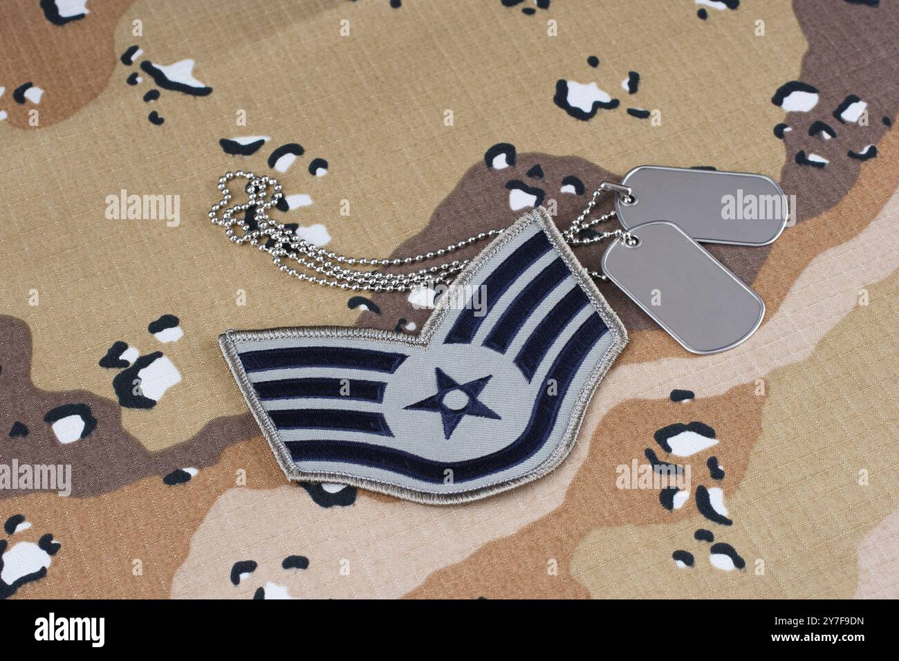 US AIR FORCE Staff Sergeant rank patch and dog tags on desert ...