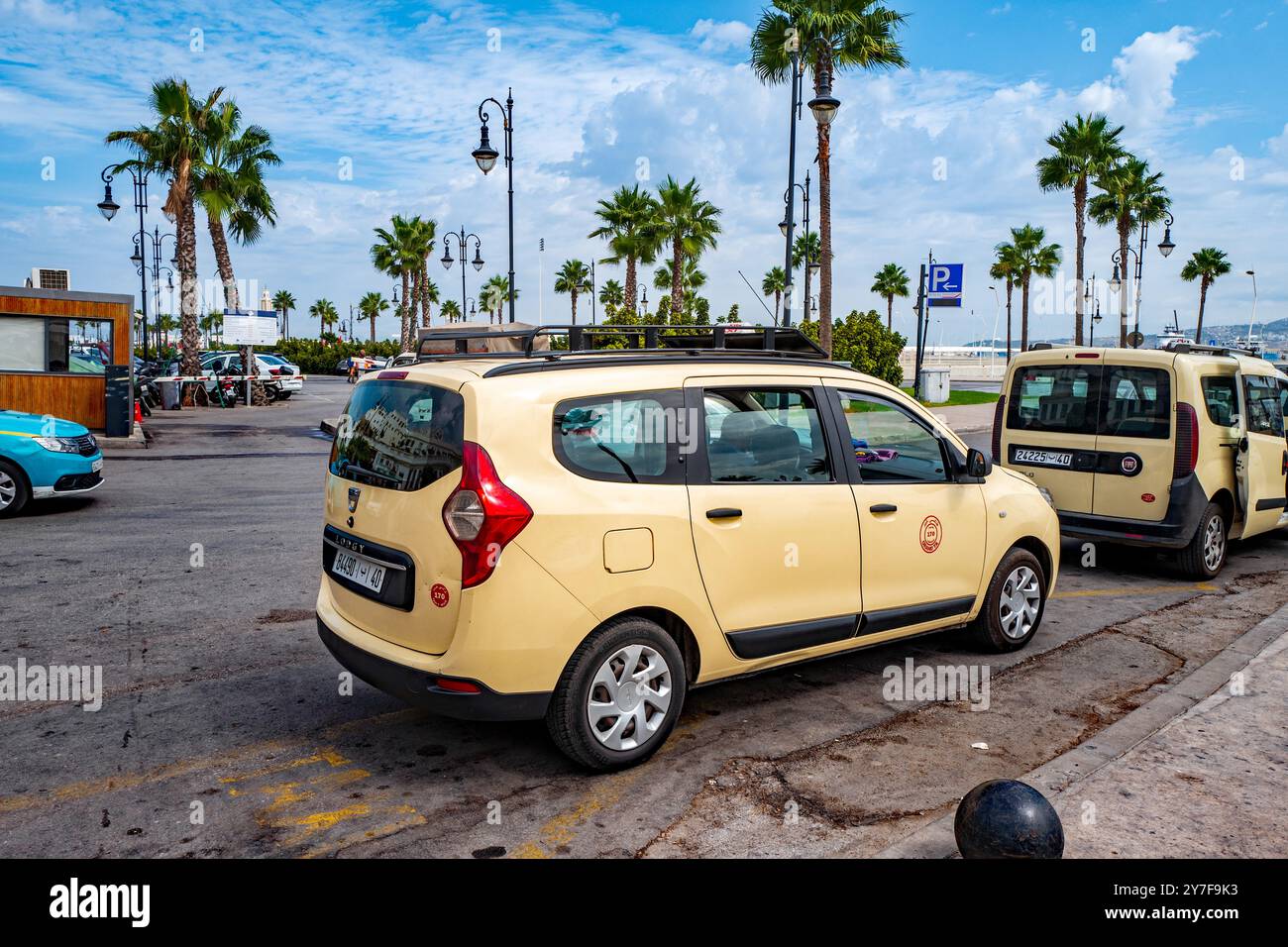 Grand Taxis in Tangier are beige, larger and more expensive than Petit ...